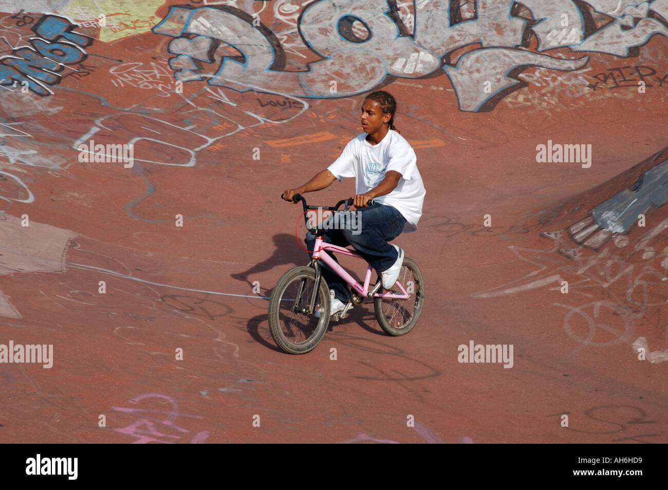 Youths on BMX cycles at urban Skate park in Brixton South London Stock ...