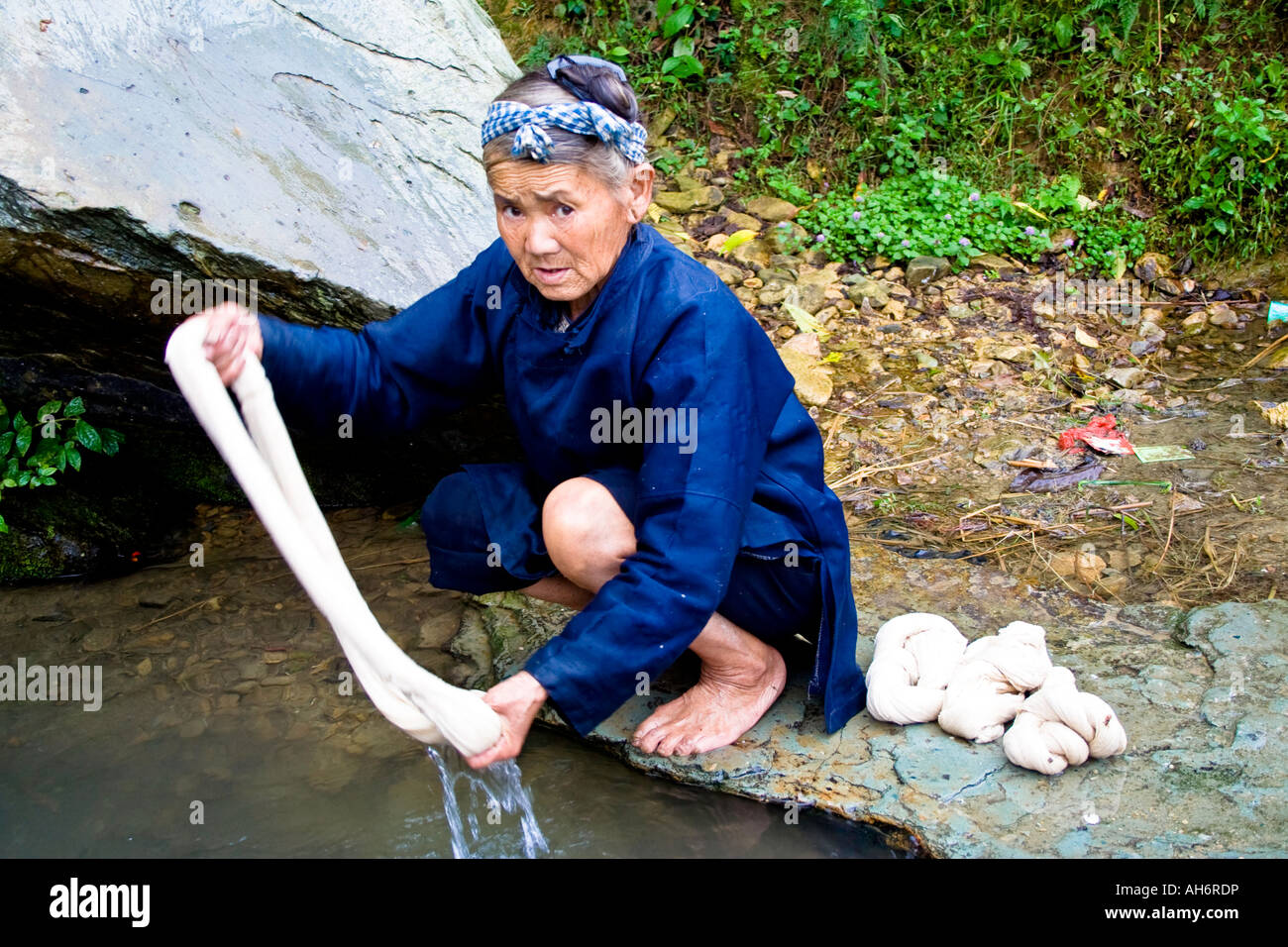 Woman washing clothes folk village hi-res stock photography and images ...