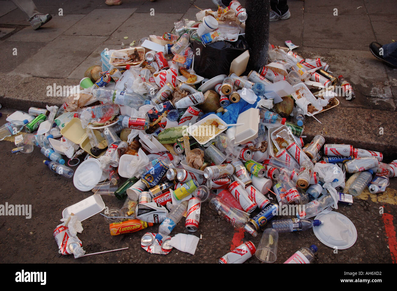 garbage on pavement Stock Photo - Alamy