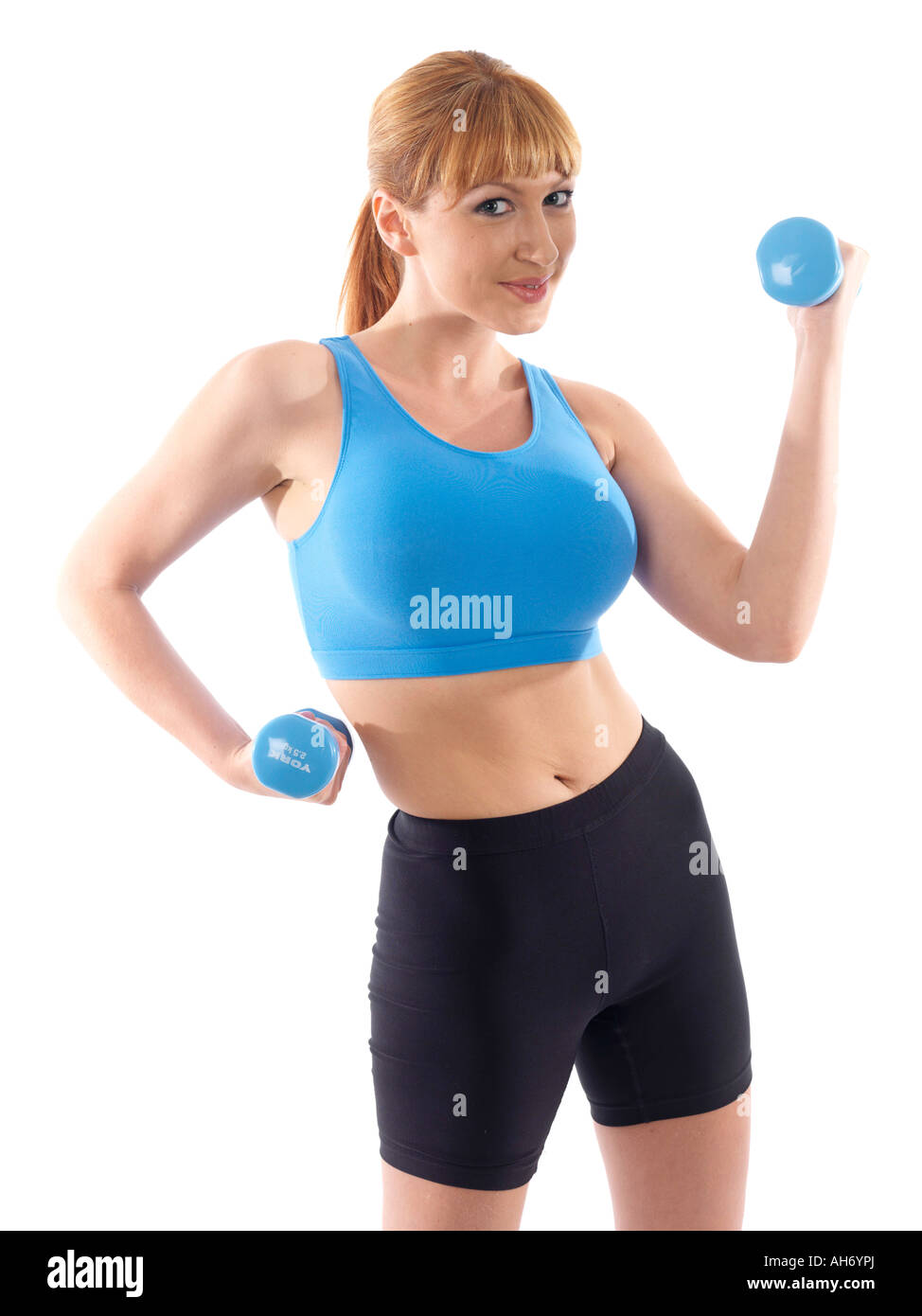 Young Woman Lifting Weights Model Released Stock Photo - Alamy