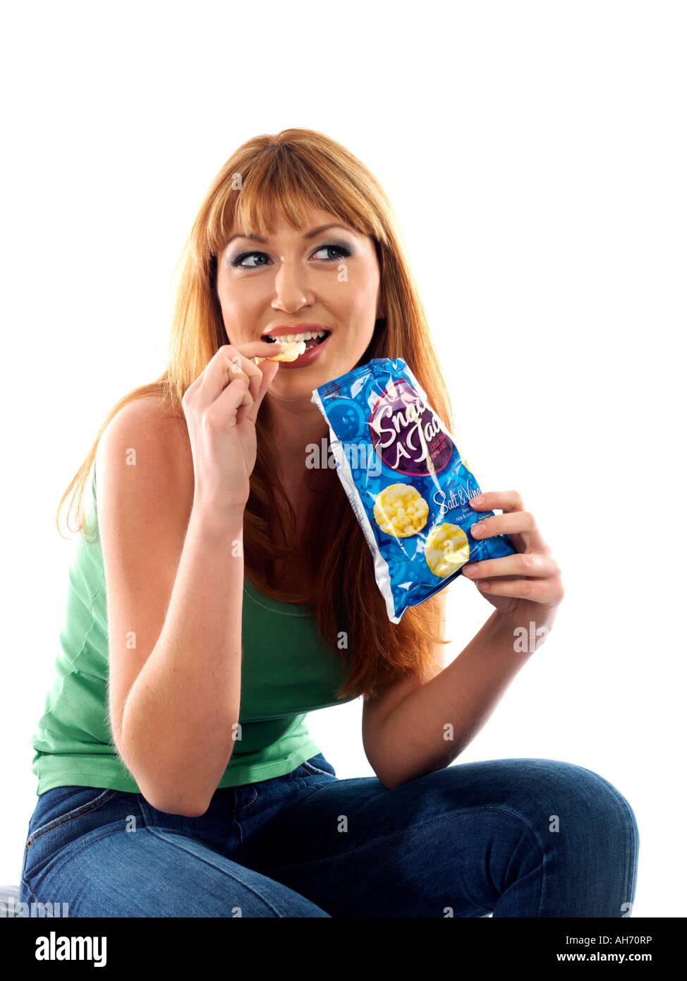 Woman eating snack a jacks snacking hi-res stock photography and images ...