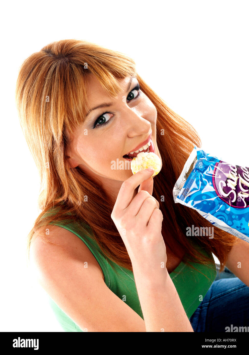 Woman Eating Snack A Jacks Model Released Stock Photo - Alamy