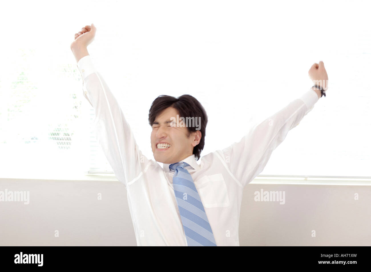 Overstretching oneself office worker Stock Photo - Alamy