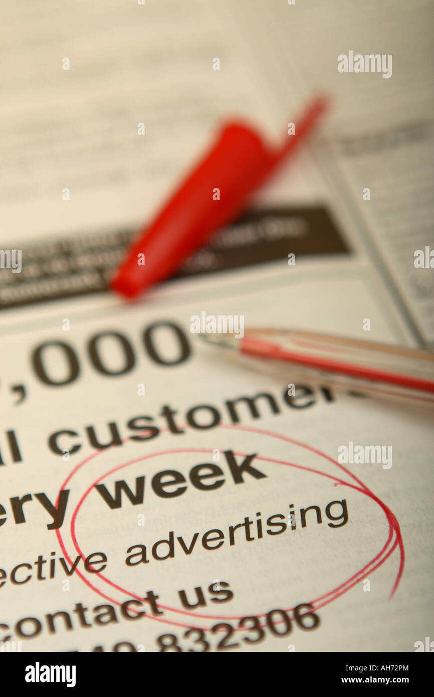 Newspaper advert advertising marketing ad Stock Photo - Alamy