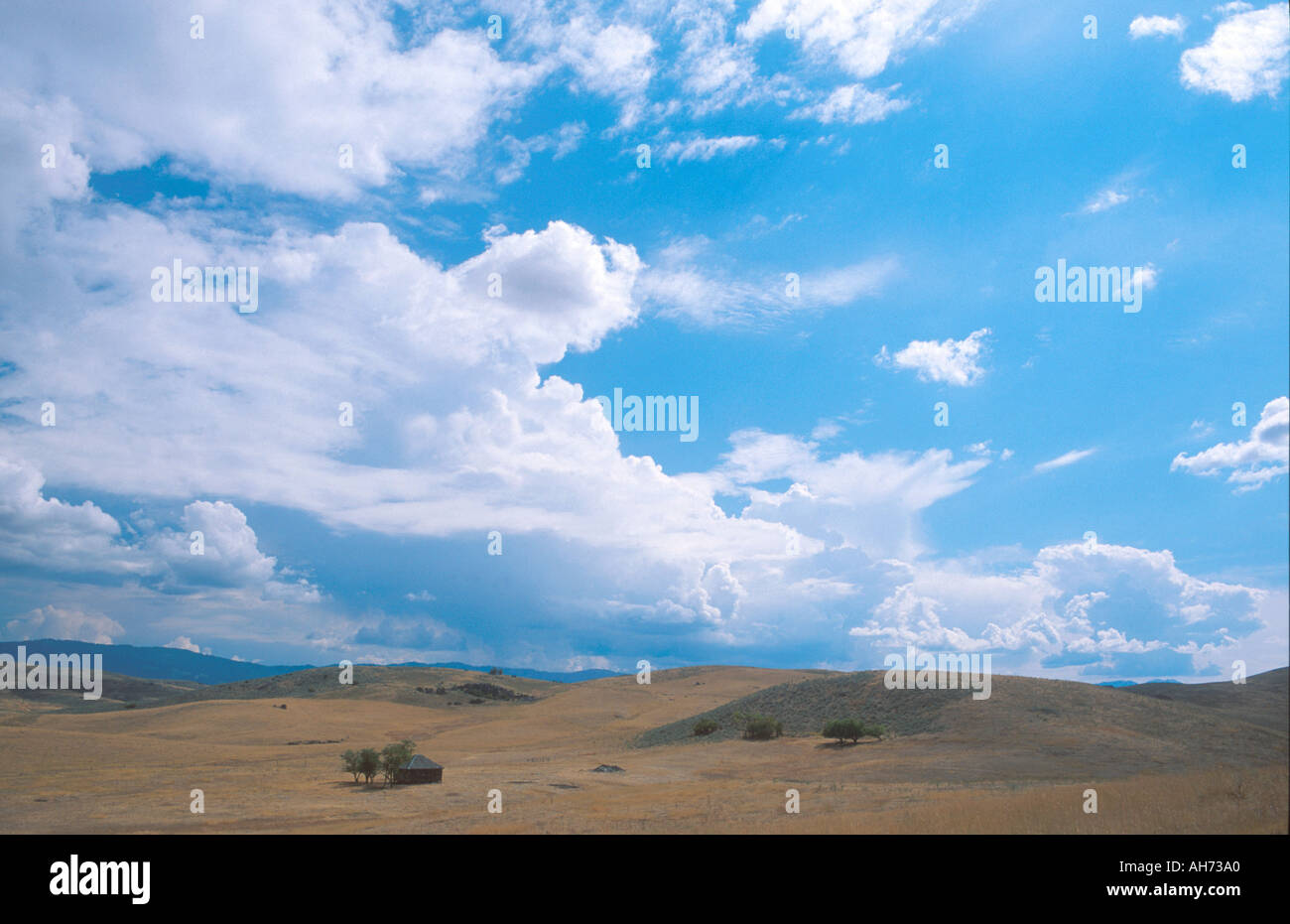 Western big sky north of Boise Idaho with blue sky and cumulus clouds ...
