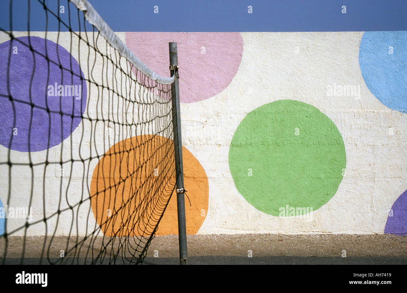 Volleyball net and painted wall Stock Photo - Alamy