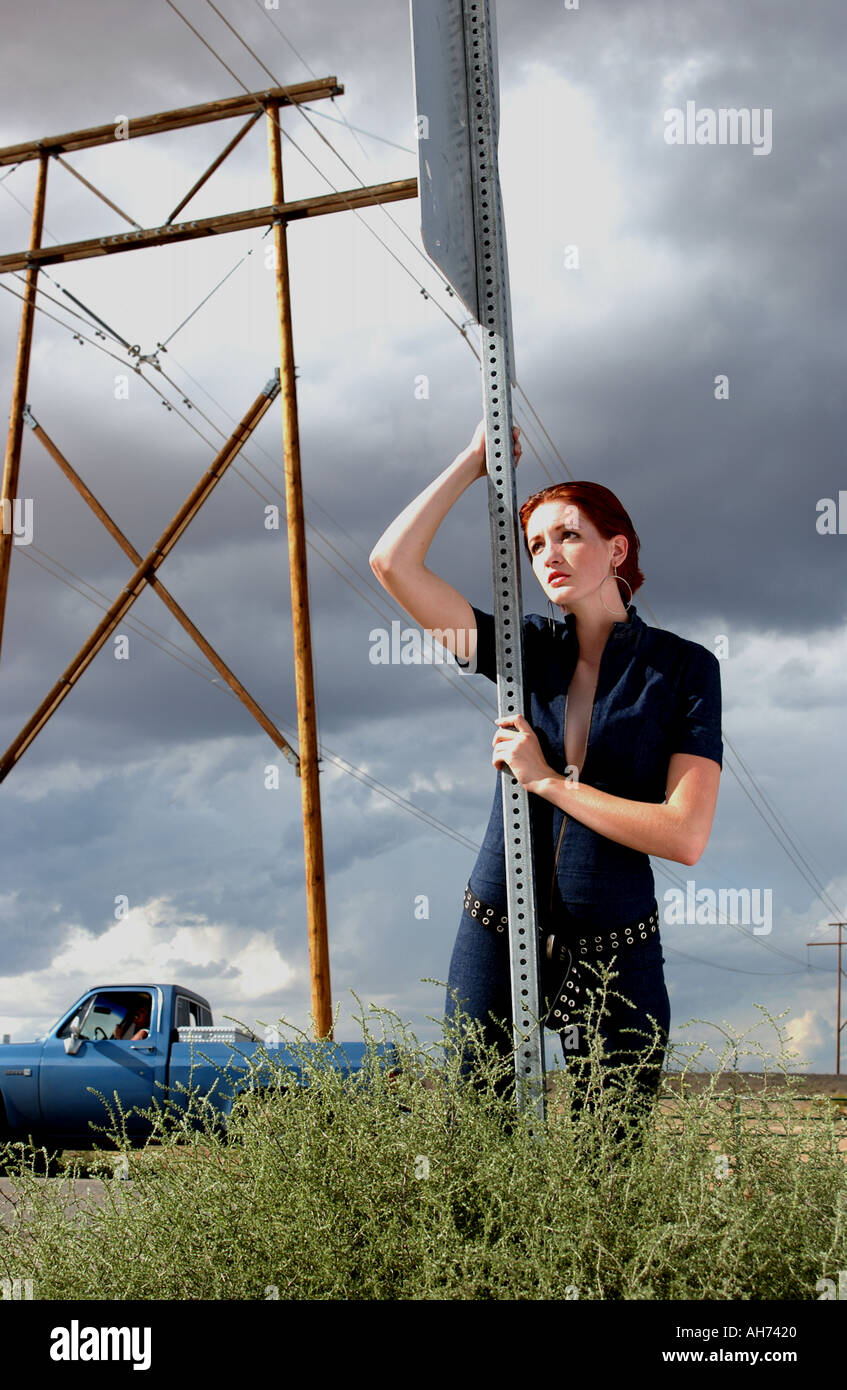 Girl gazing with dramatic background Stock Photo - Alamy