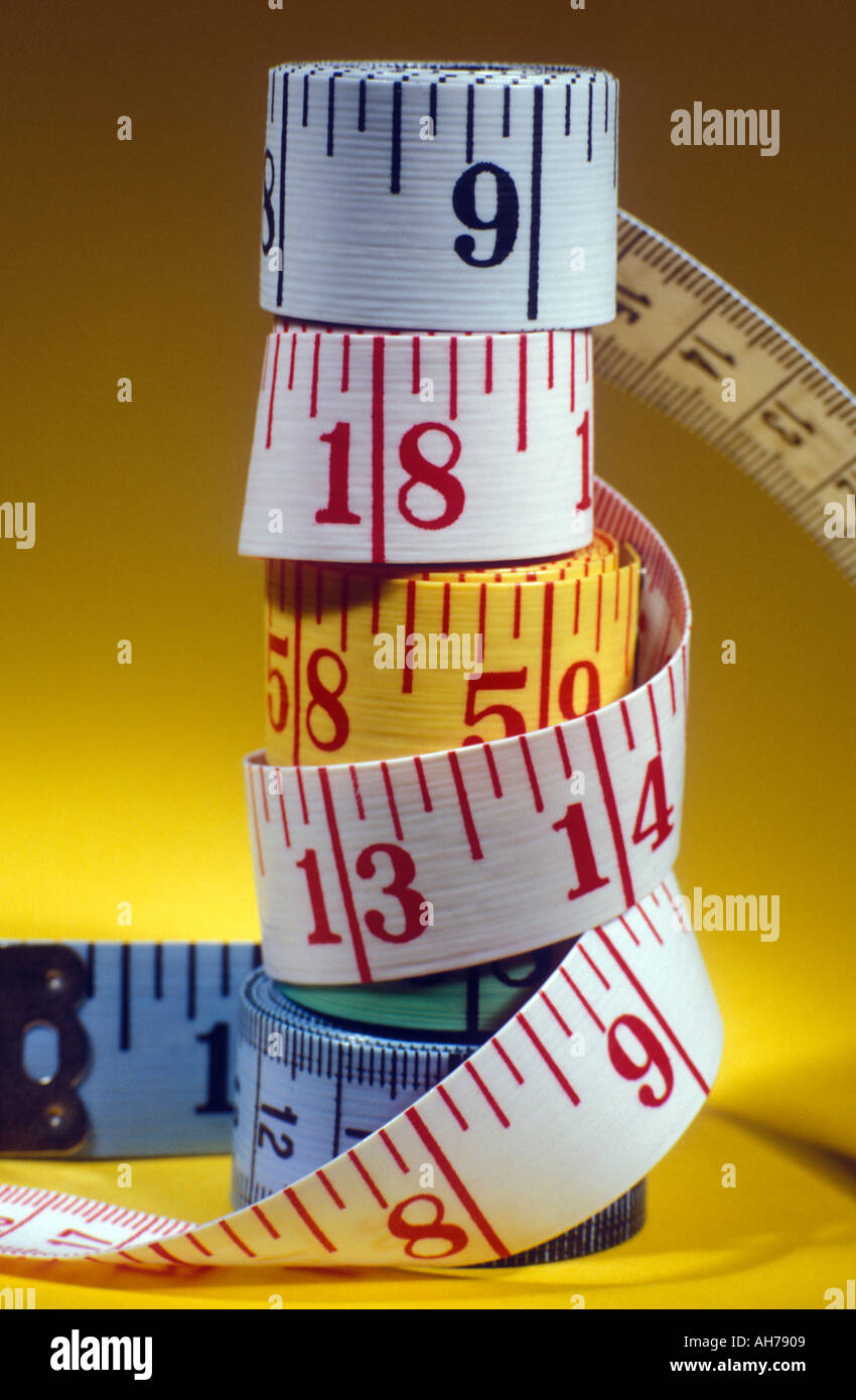 Pile of Tape Measures Stock Photo - Alamy