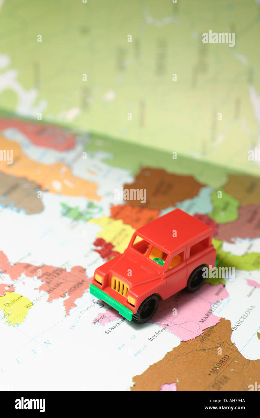 Toy Car and Atlas Stock Photo - Alamy