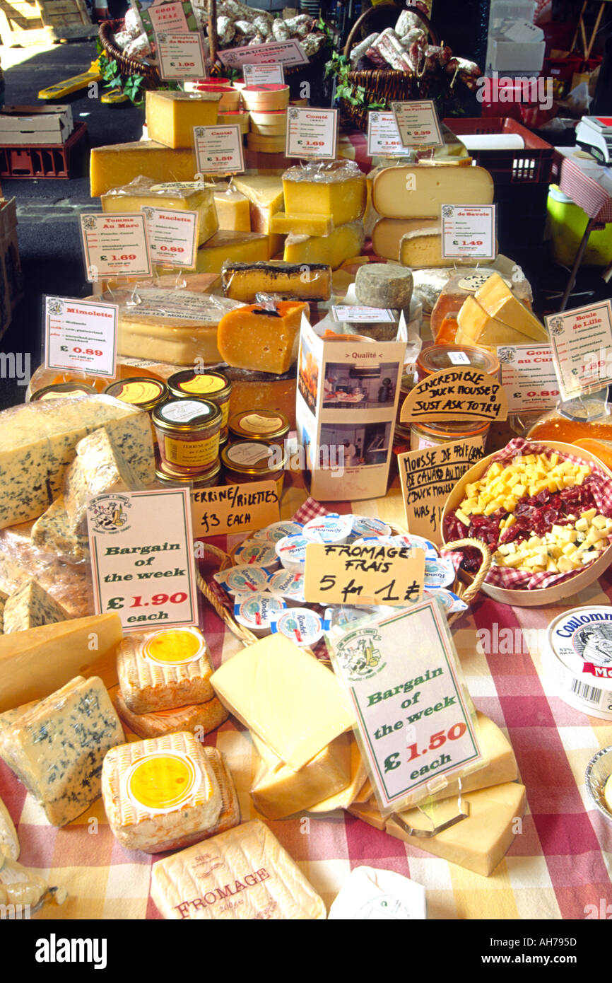 Cheese for sale at a market stall in London Stock Photo - Alamy
