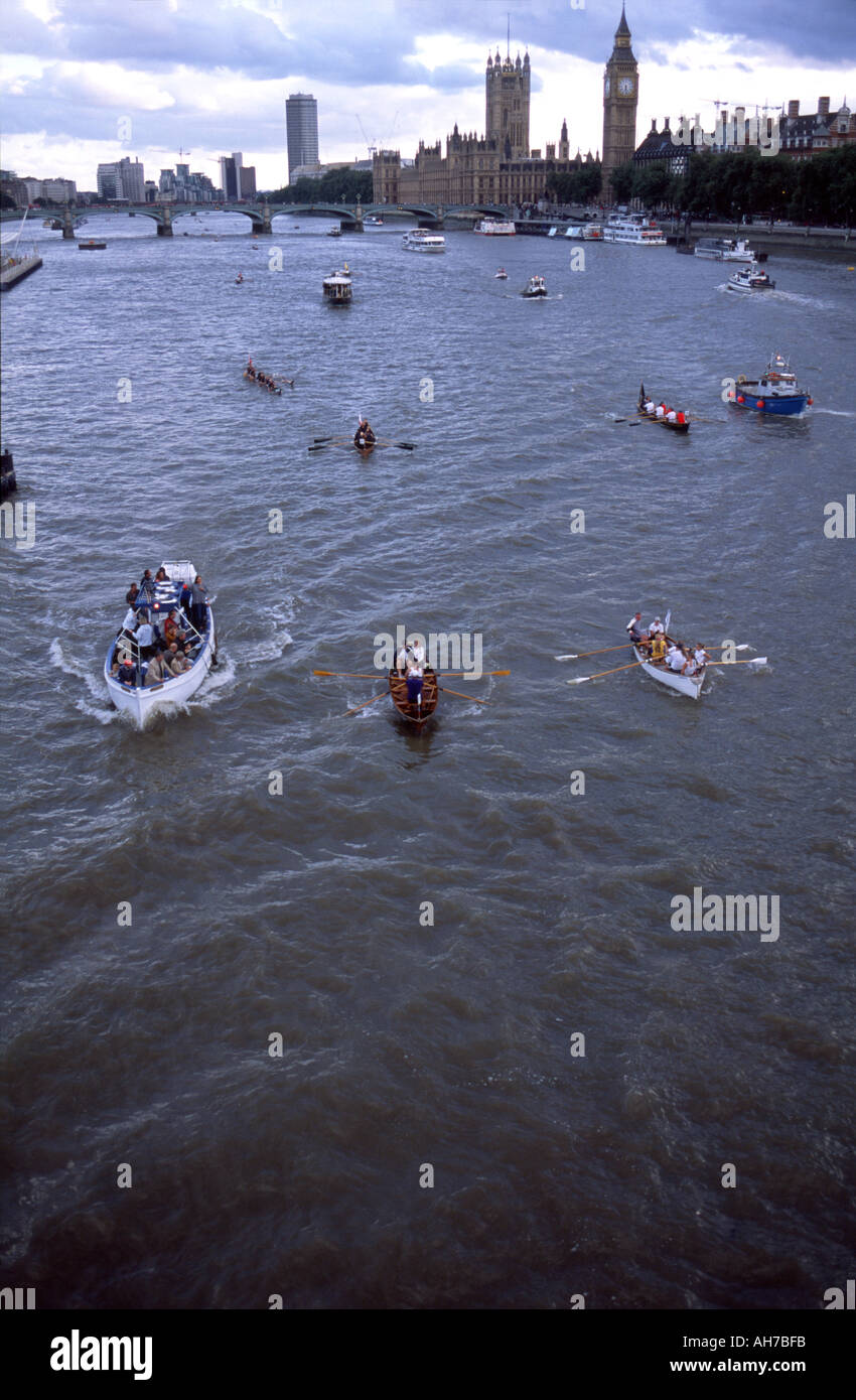The Great River Race on the Thames with the Houses of Parliament in the ...