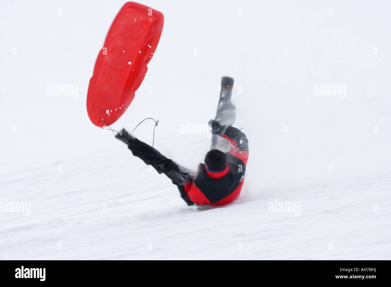 Adult man sliding down slide hi-res stock photography and images - Alamy