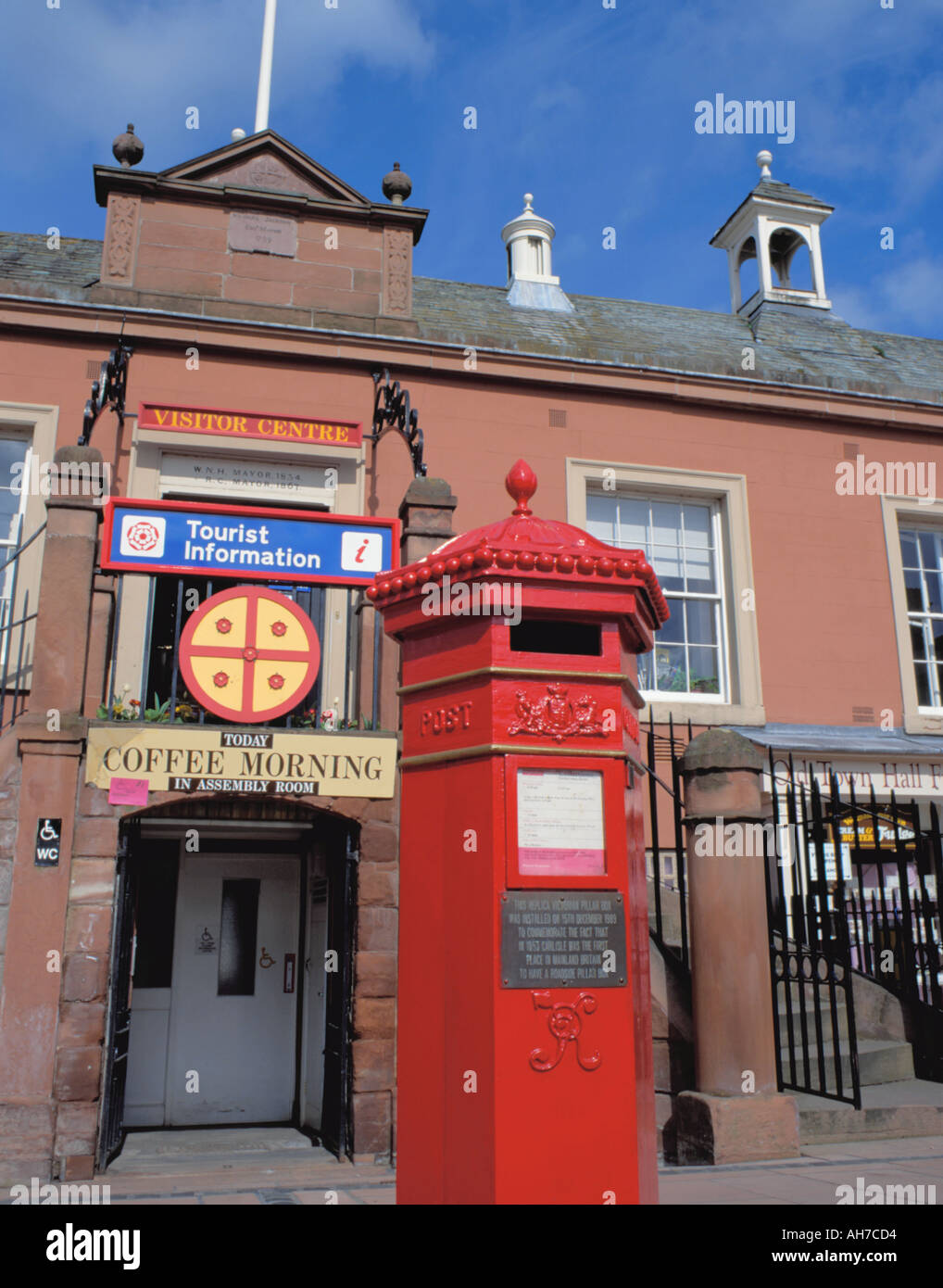 Replica red Victorian pillar box outside the picturesque 18th century ...