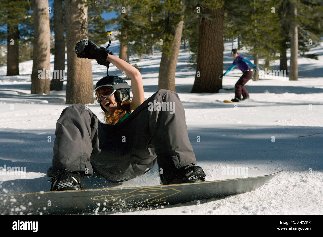 Two young women snowboarding hi-res stock photography and images - Alamy