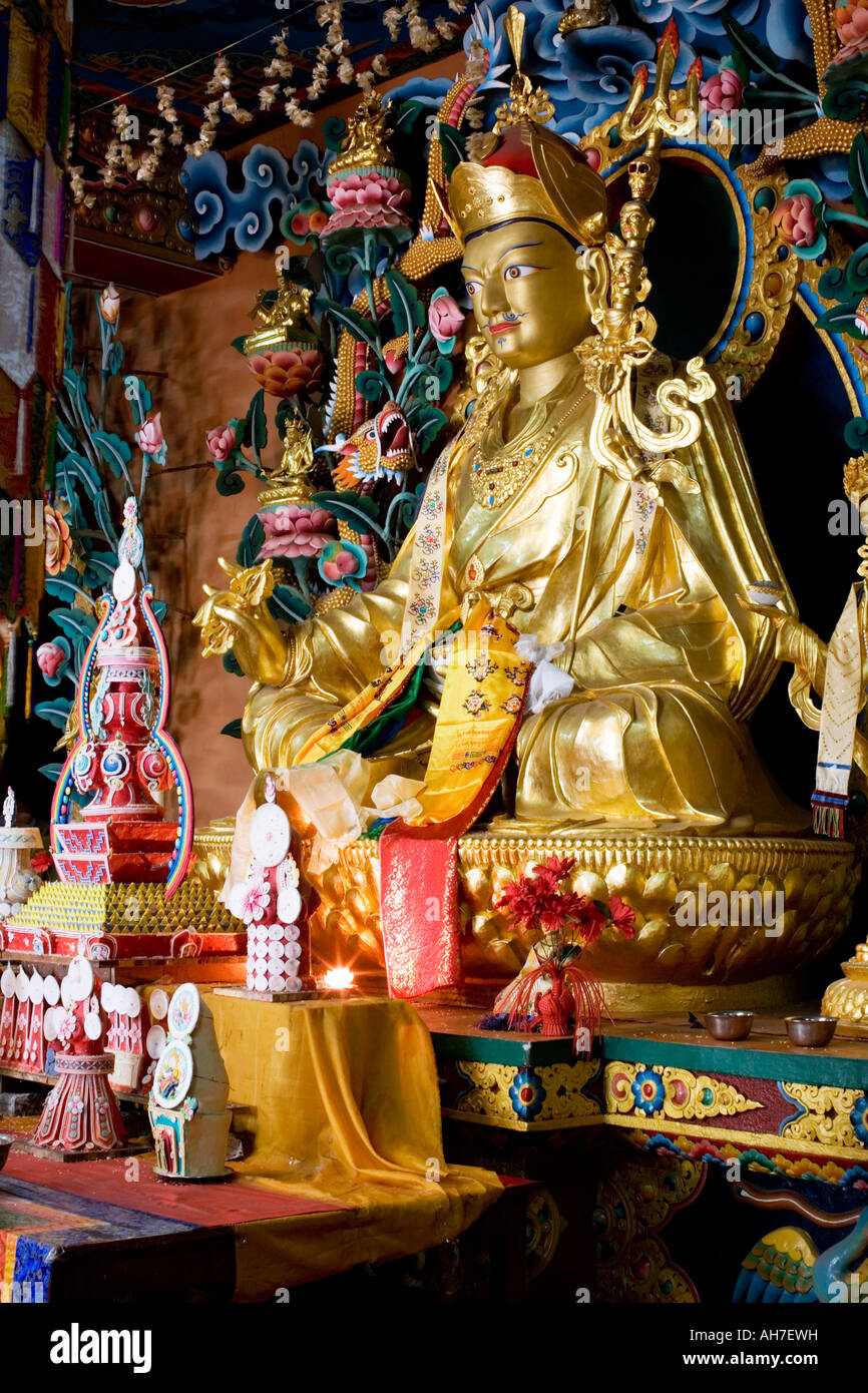 Golden Guru Rinpoche statue in a Tibetan buddhist monastery. Boudhanath ...