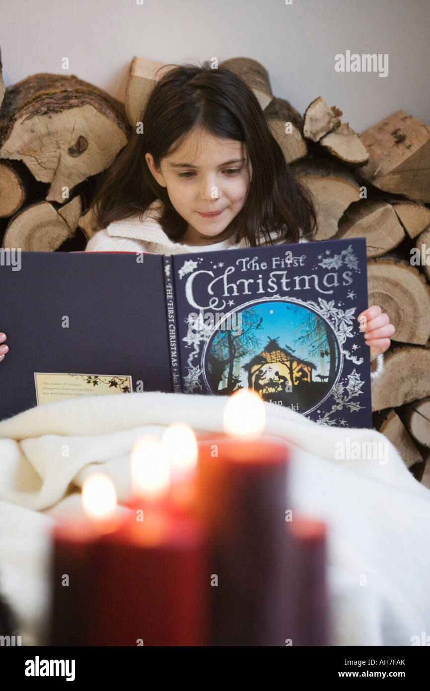 Girl reading a book Stock Photo - Alamy