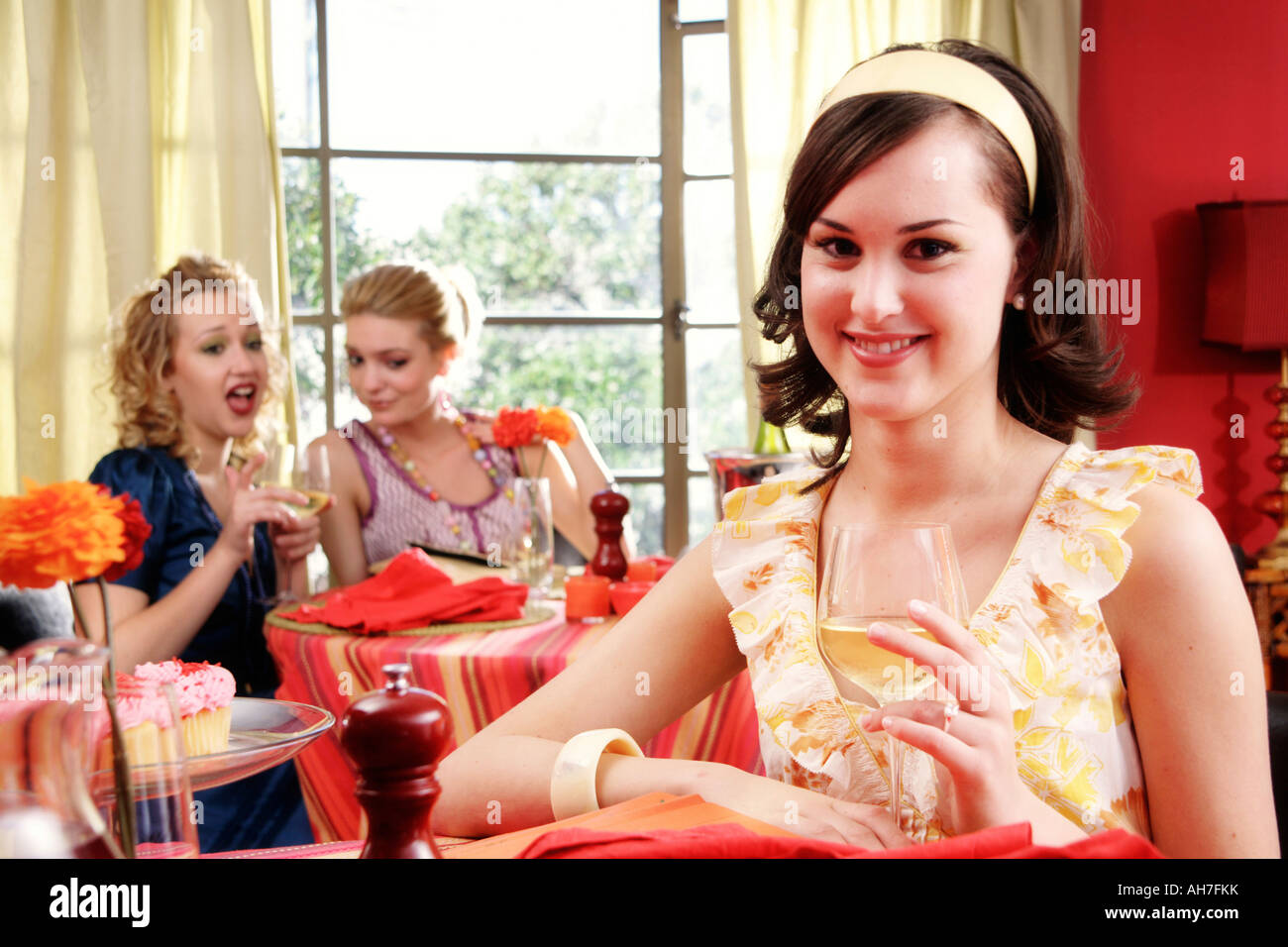 Three women behind the table in restaurant hi-res stock photography and ...