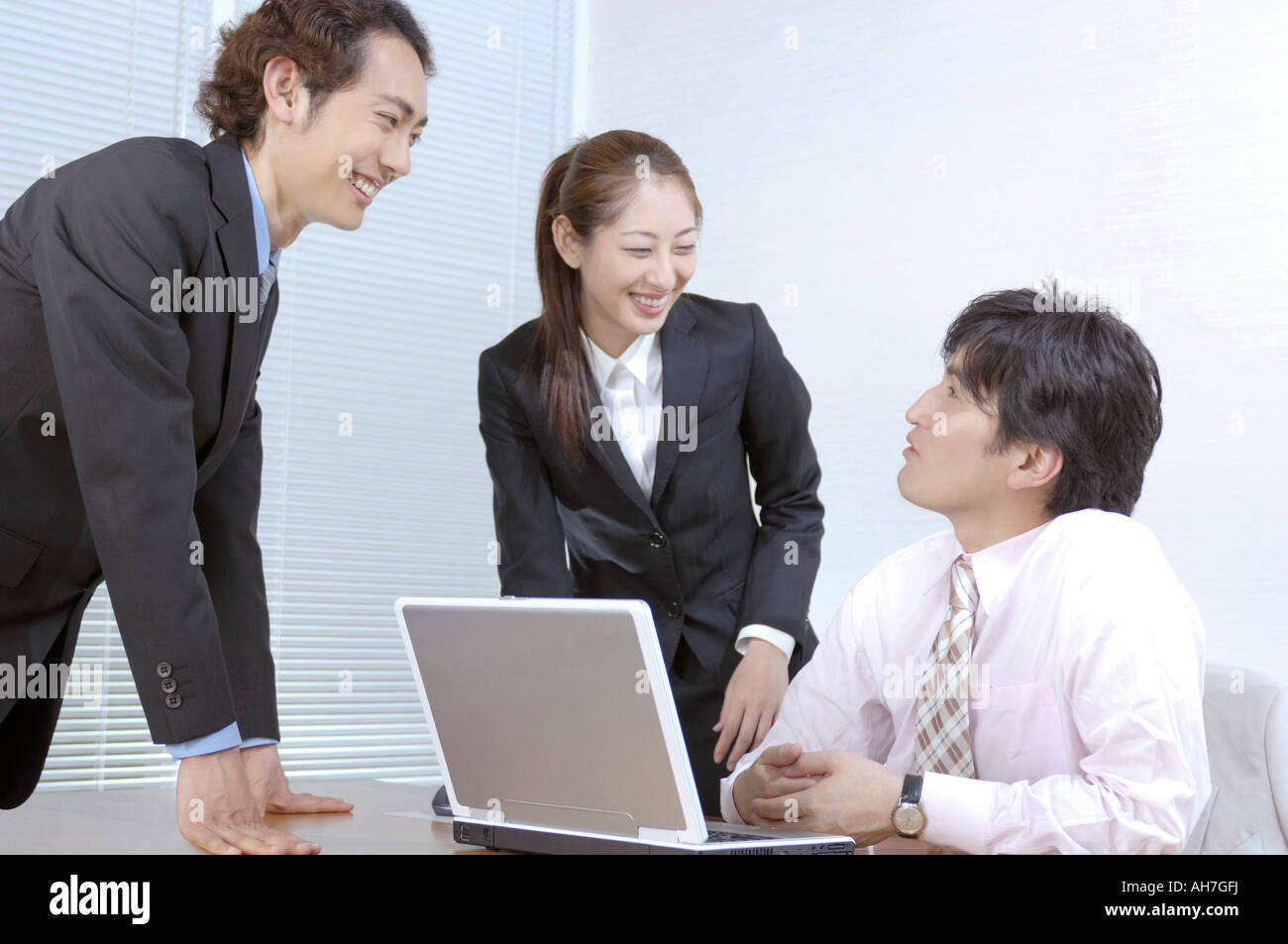 Arranging office workers Stock Photo - Alamy