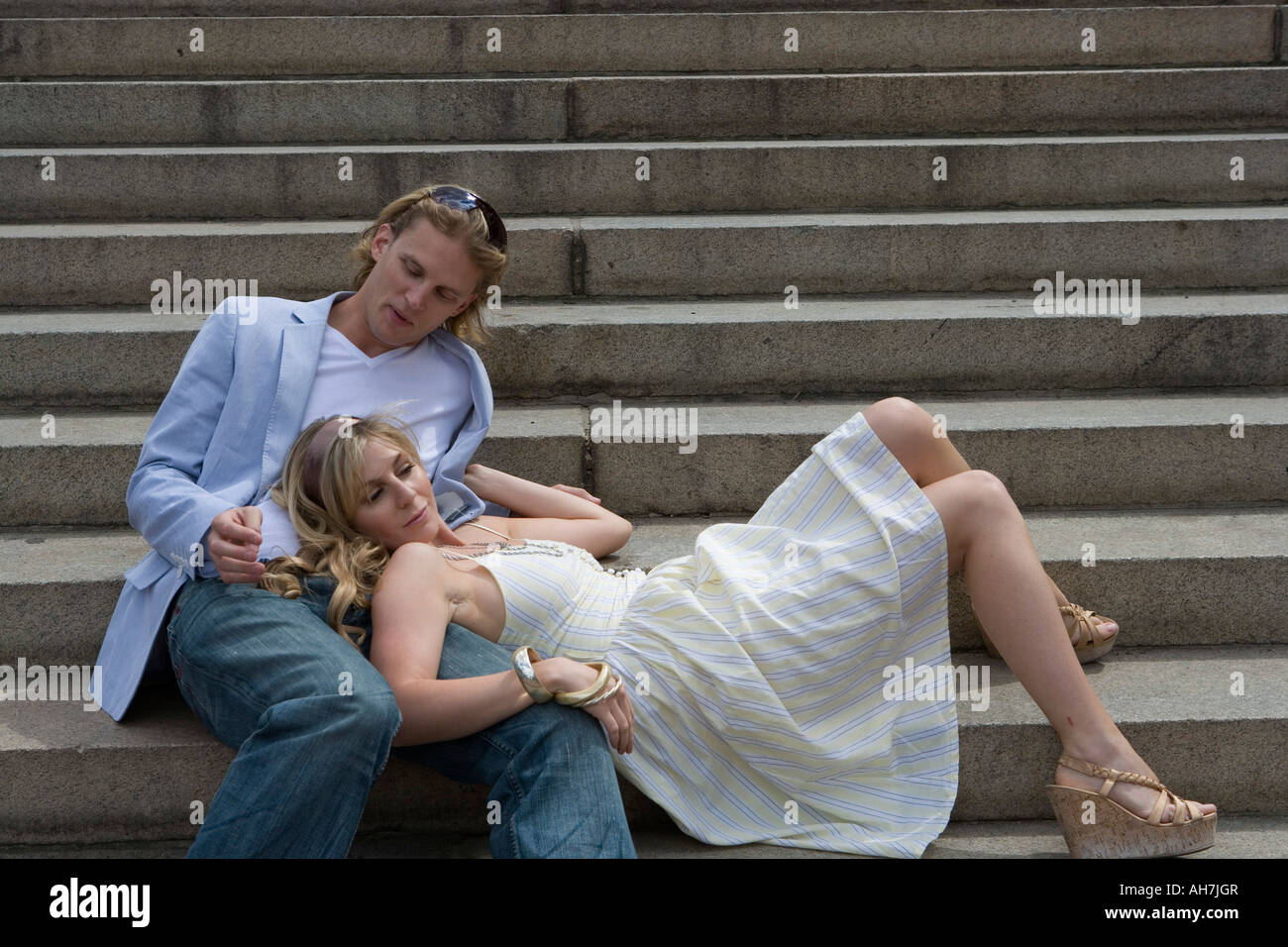 Woman sitting on mans lap hi-res stock photography and images - Alamy