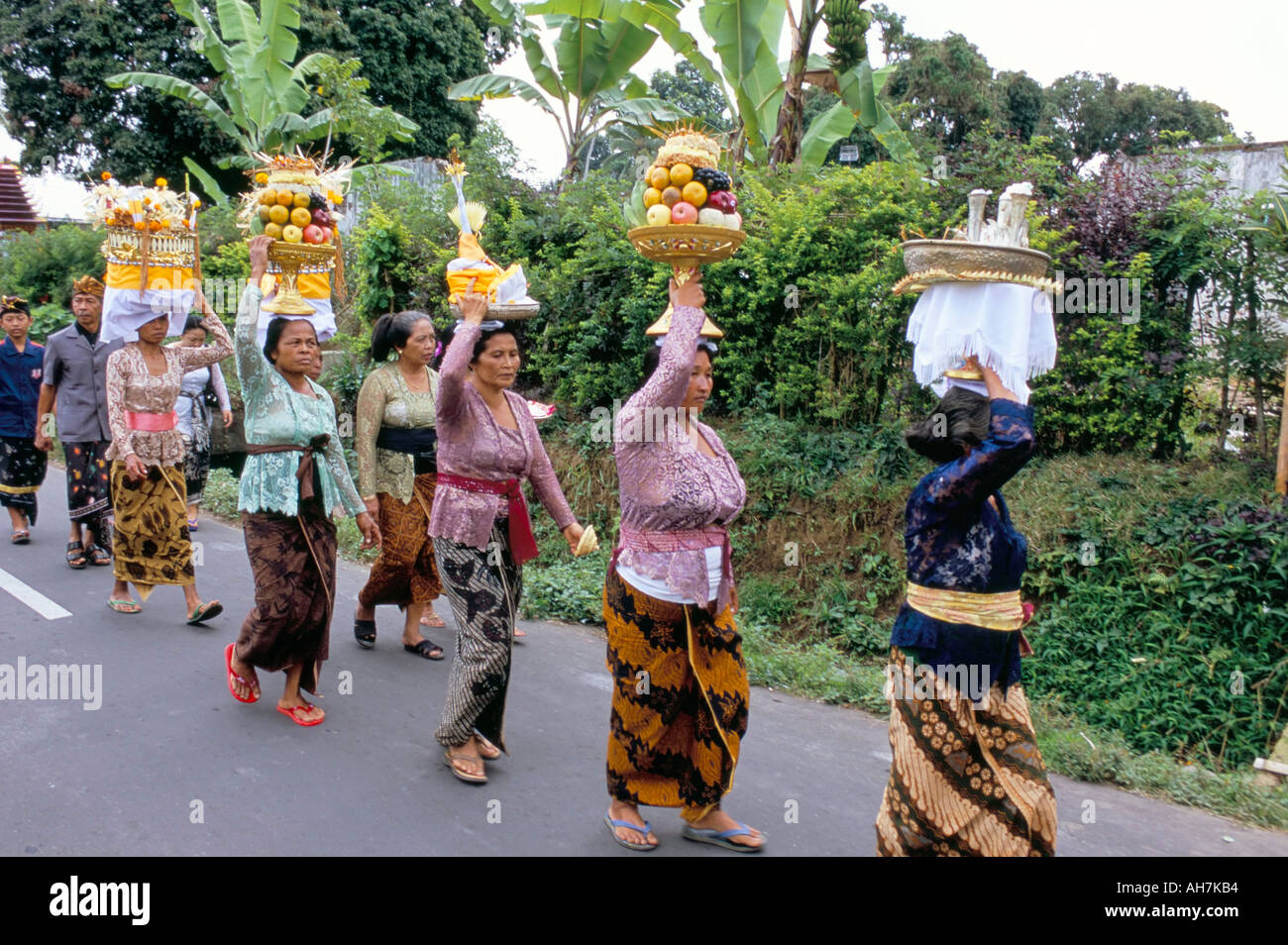 Women in procession for funeral ceremony island of Bali Indonesia ...