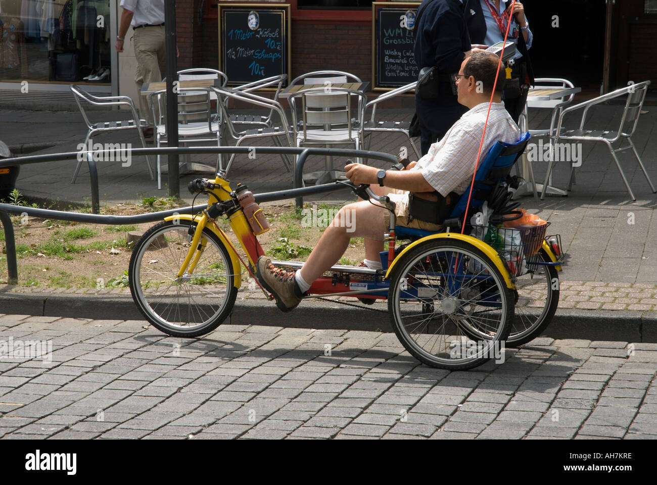 German man on tricycle, Cologne Stock Photo - Alamy