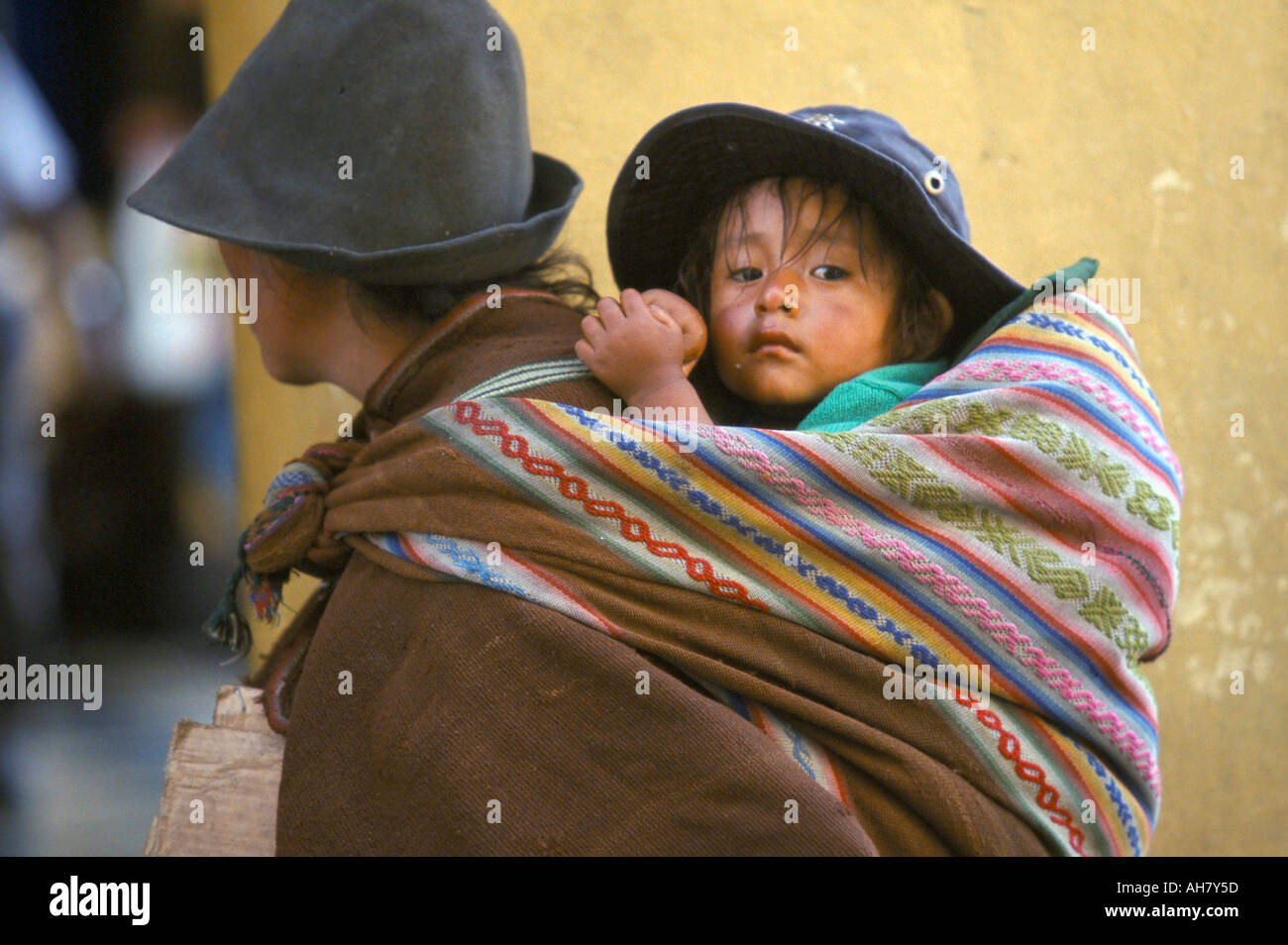 Peruvian woman carrying child on hi-res stock photography and images ...