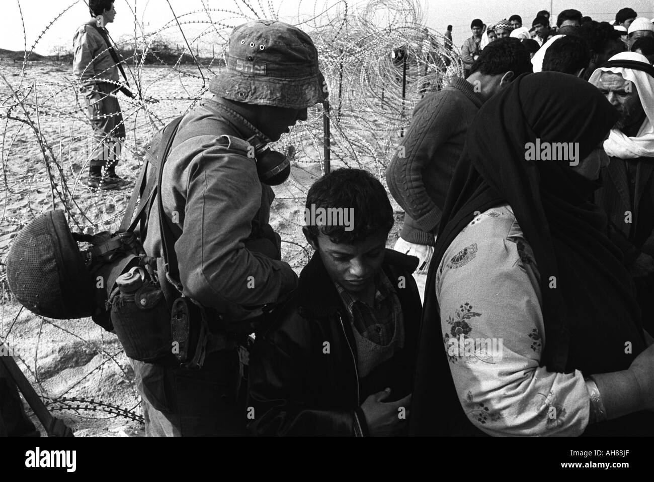 A young boy with family members waits to enter the Israeli Ansar II ...