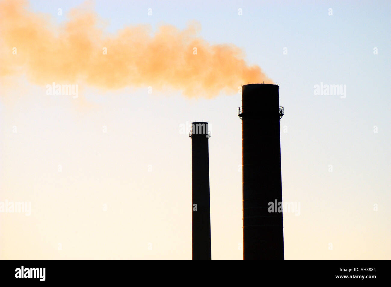 Smoking chimneys polluting the environment Stock Photo - Alamy