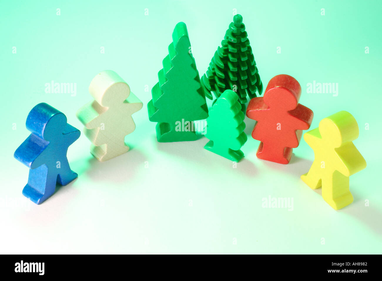Wooden Children Figures and Toy Trees Stock Photo - Alamy
