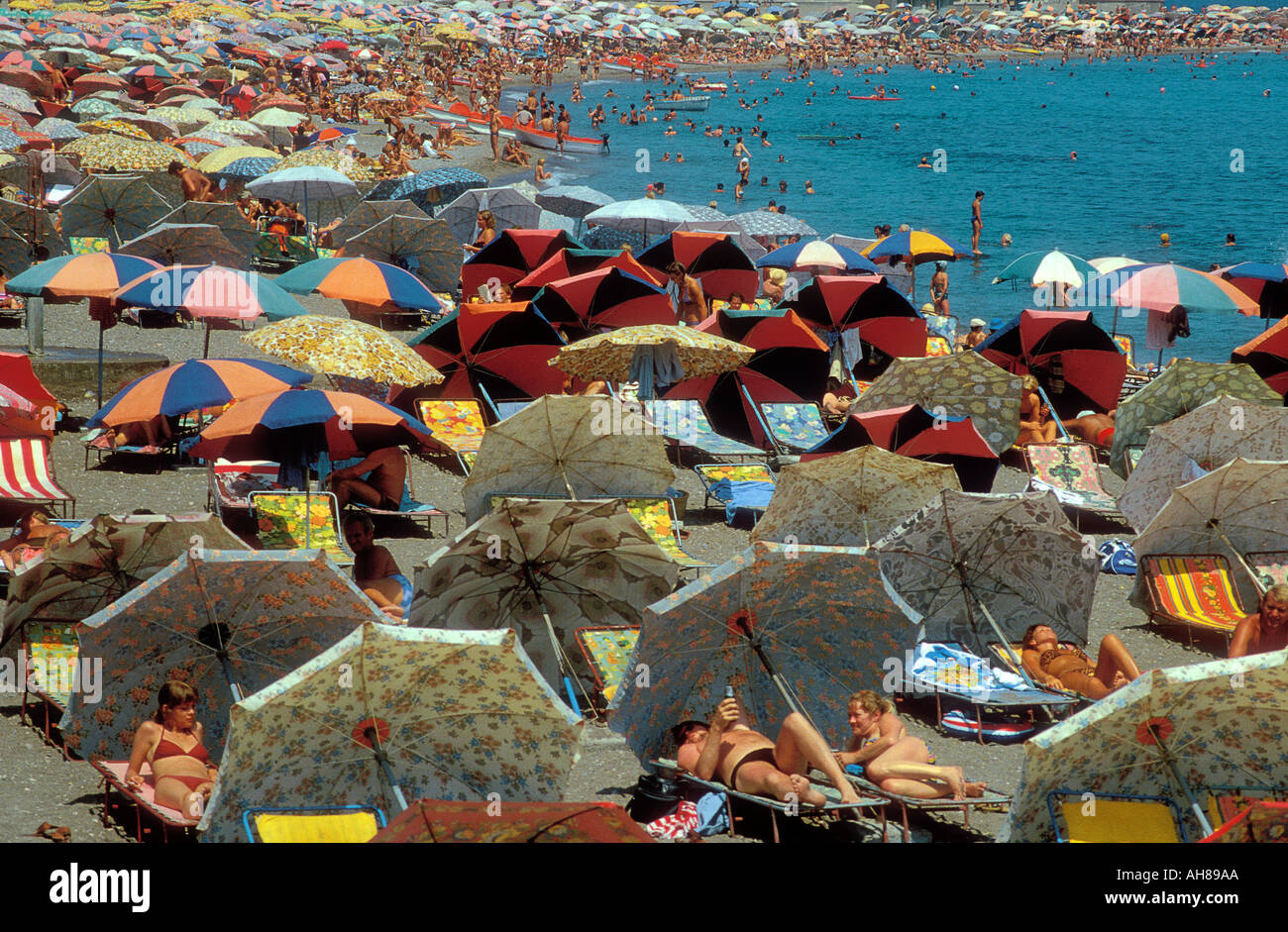 A crowded beach on the Greek island of Rhodes Stock Photo - Alamy