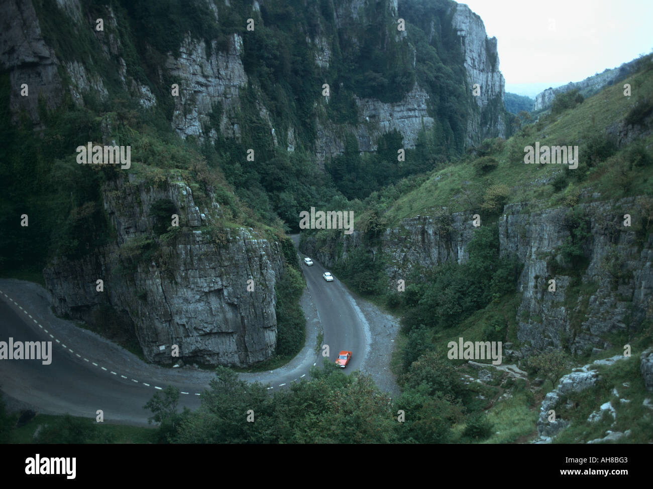 Cheddar Gorge Limestone cliffs rise 450 feet above the famous village ...