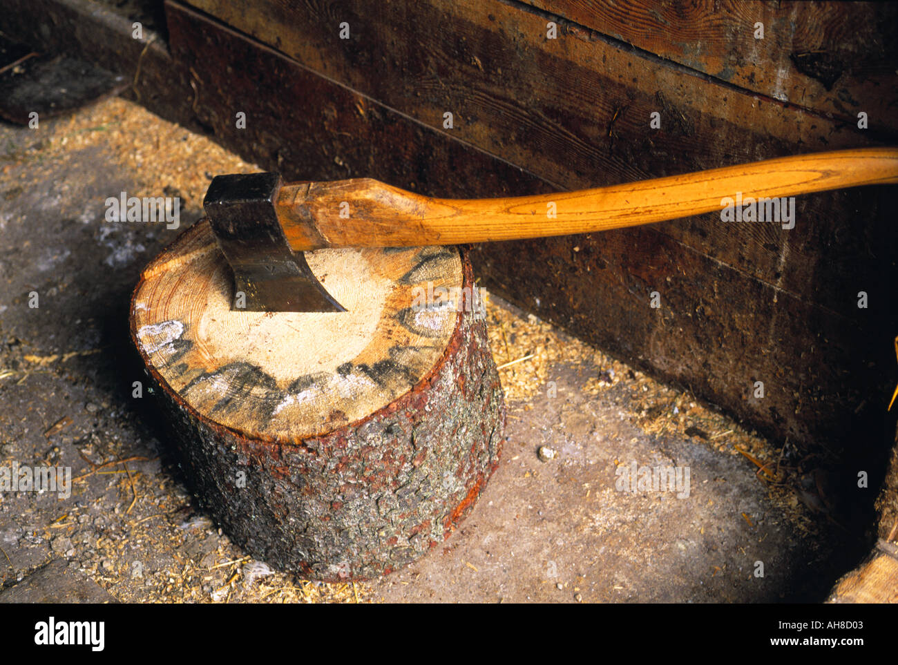 Axe at farm house Stock Photo - Alamy