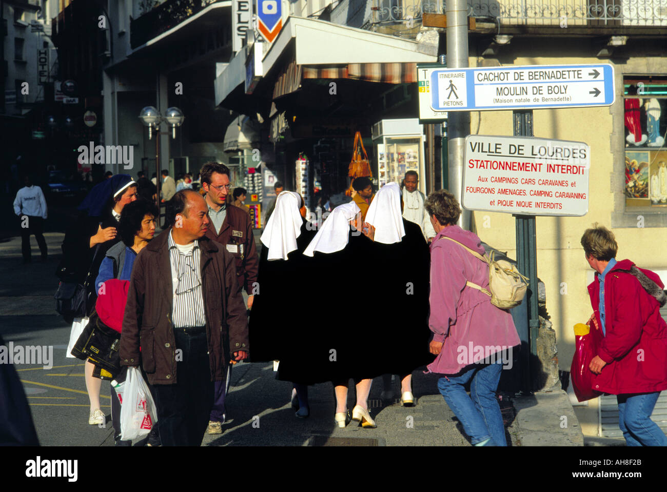 France Lourdes Virgin Mary statue street scene Stock Photo - Alamy