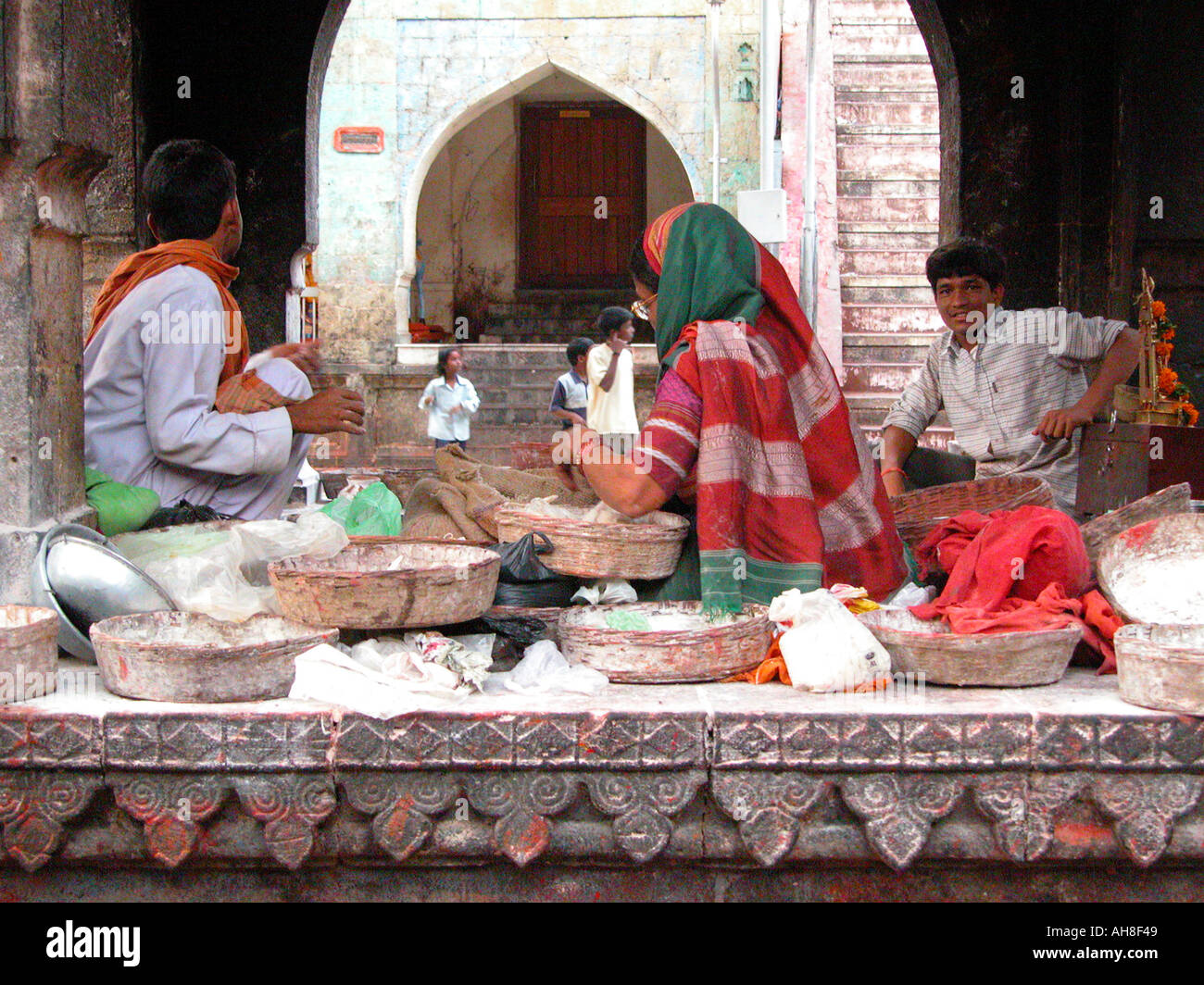 Preparation of offerings and ashes at a hindu temple Stock Photo - Alamy