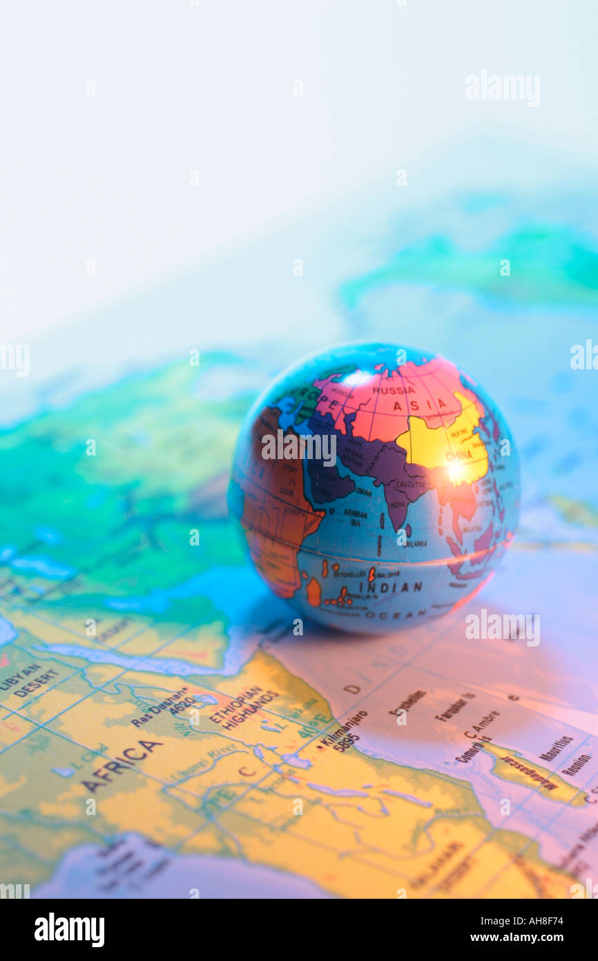 Globe on World Map Stock Photo - Alamy