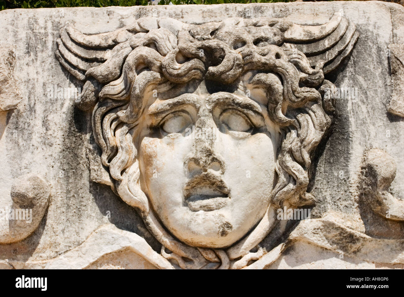 Carved stone head of Gorgon Apollo Temple Didim Altinkum Turkey Stock ...