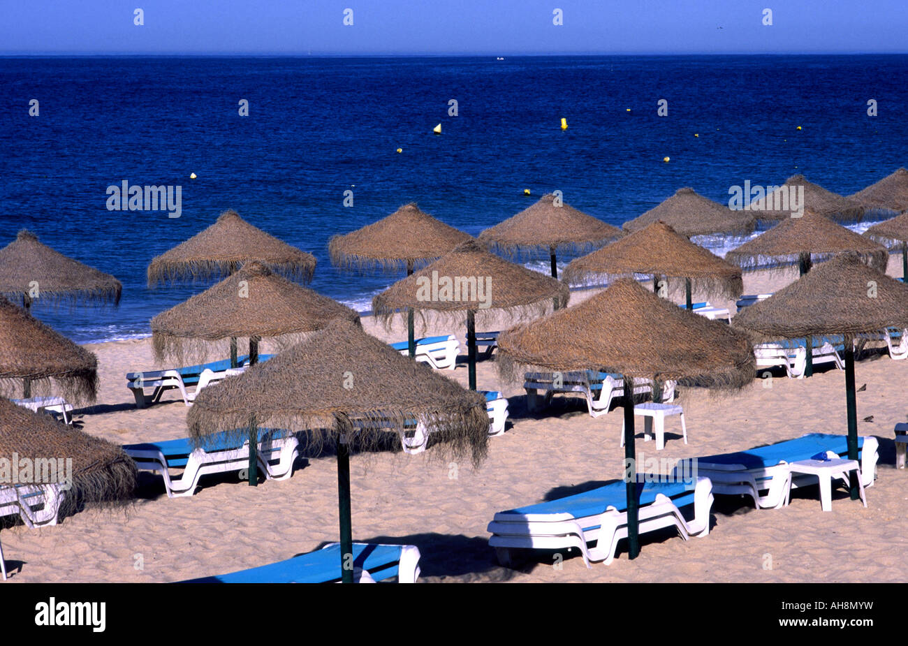 Sunshades. Ancão beach. Algarve. Portugal Stock Photo - Alamy
