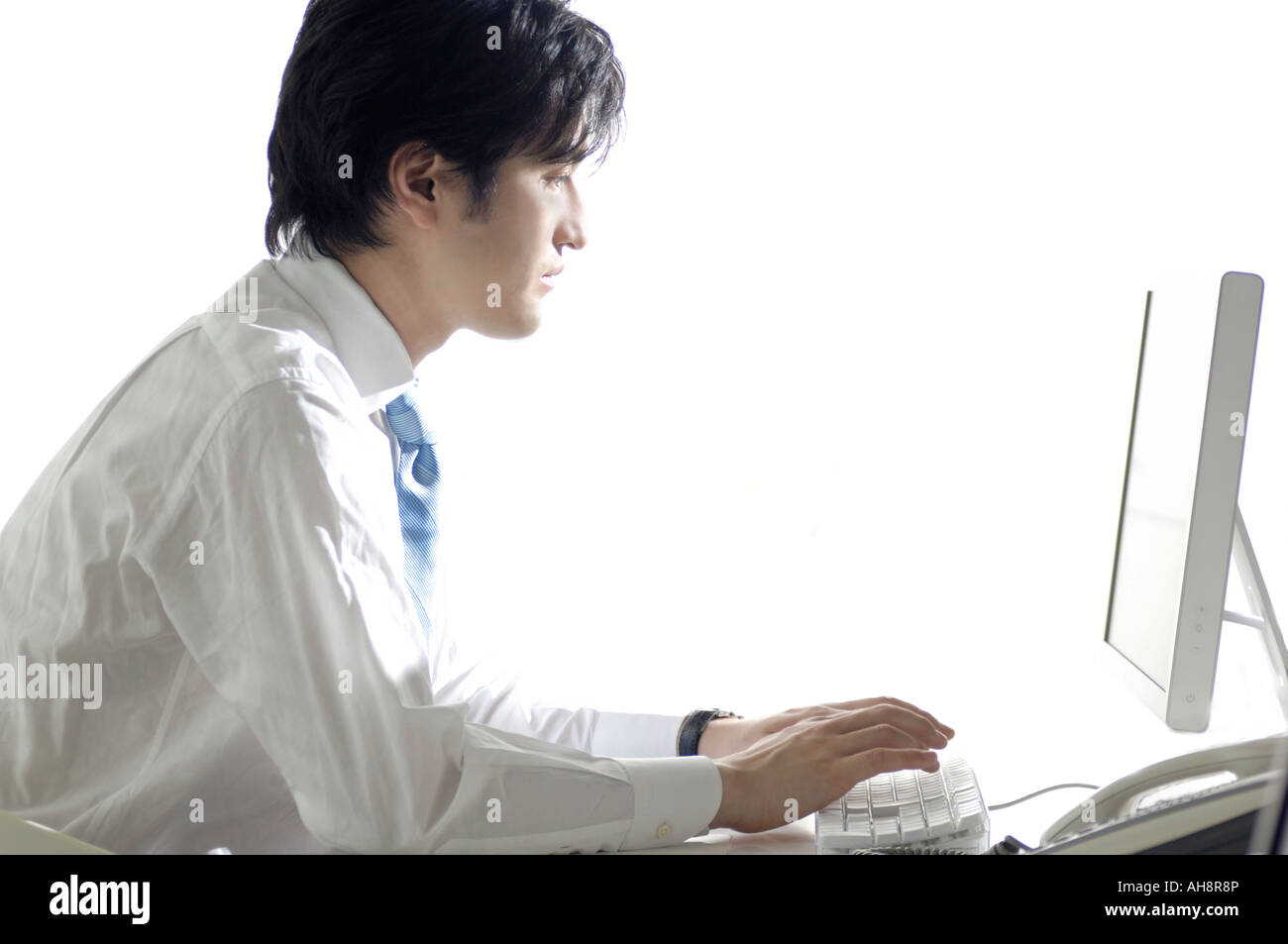 Office worker who enters a PC Stock Photo - Alamy