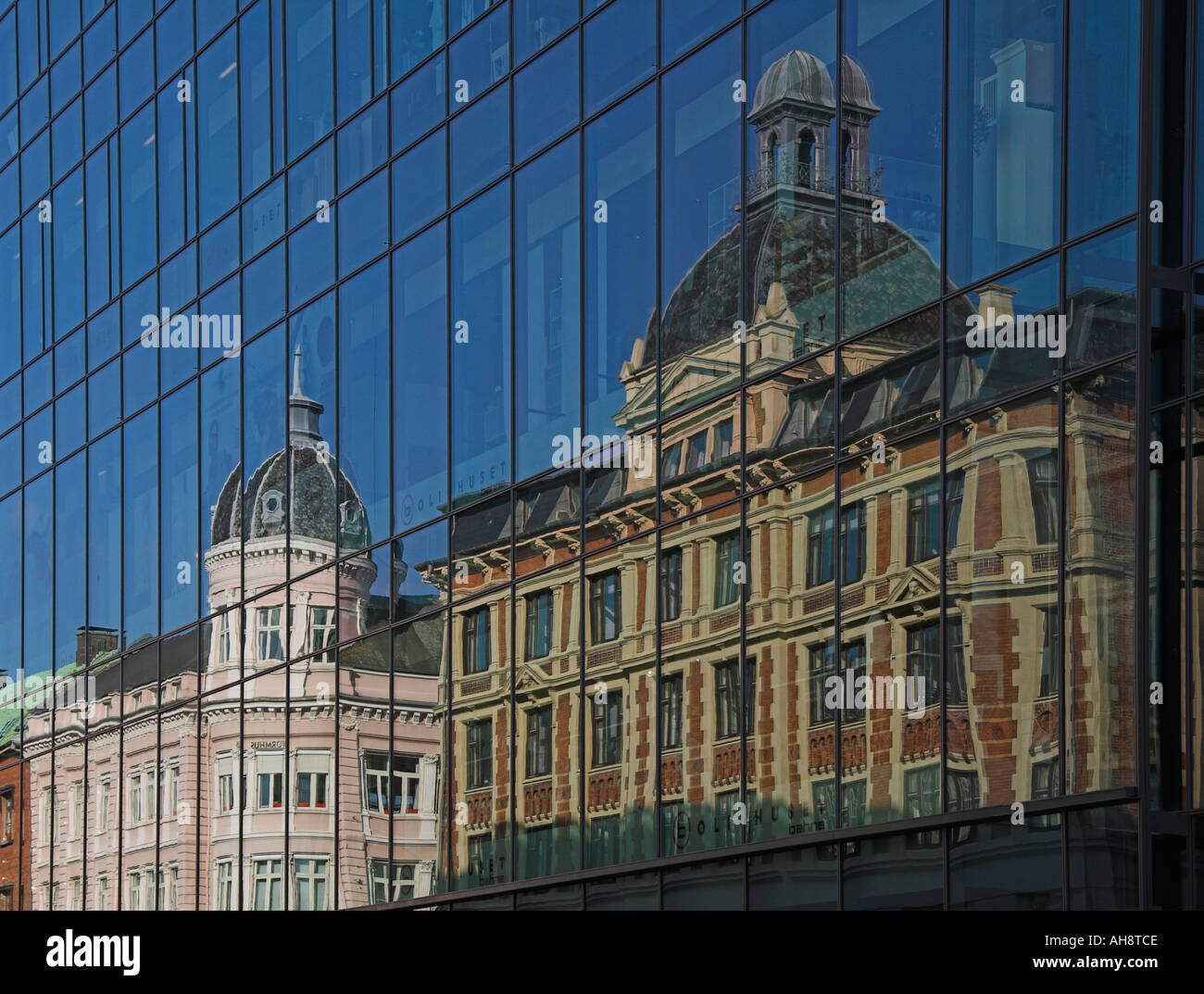 Reflections in windows of city buildings in Denmark Stock Photo - Alamy