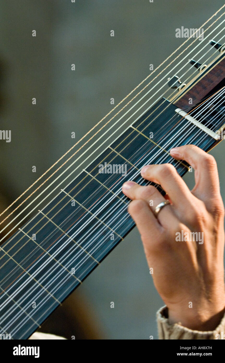 Playing the theorbo Stock Photo - Alamy