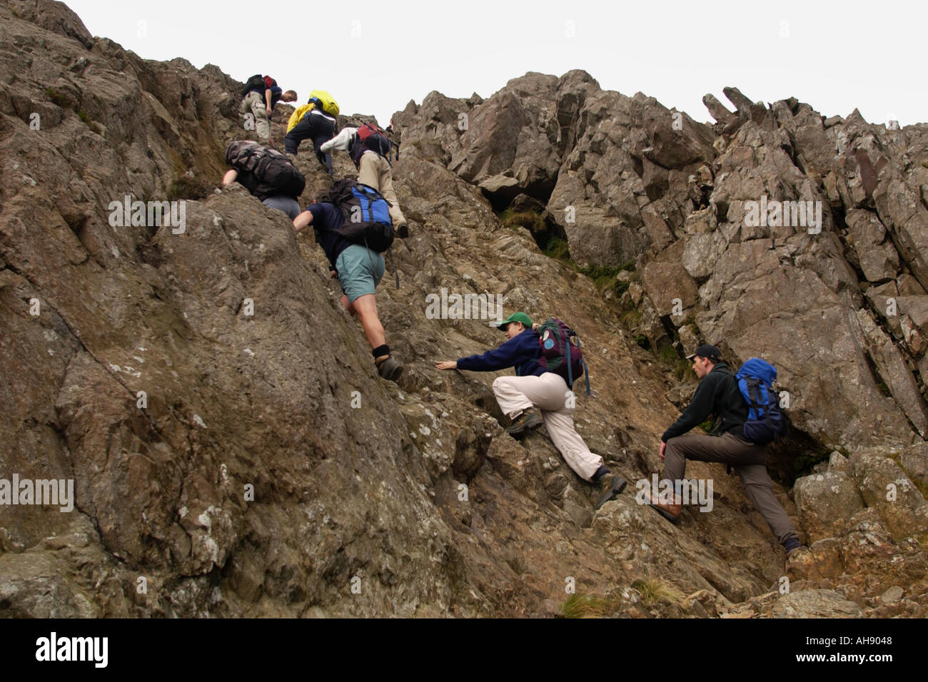 Queue to climb up the Crib Goch ridge Gwynedd North Wales UK GB Stock ...