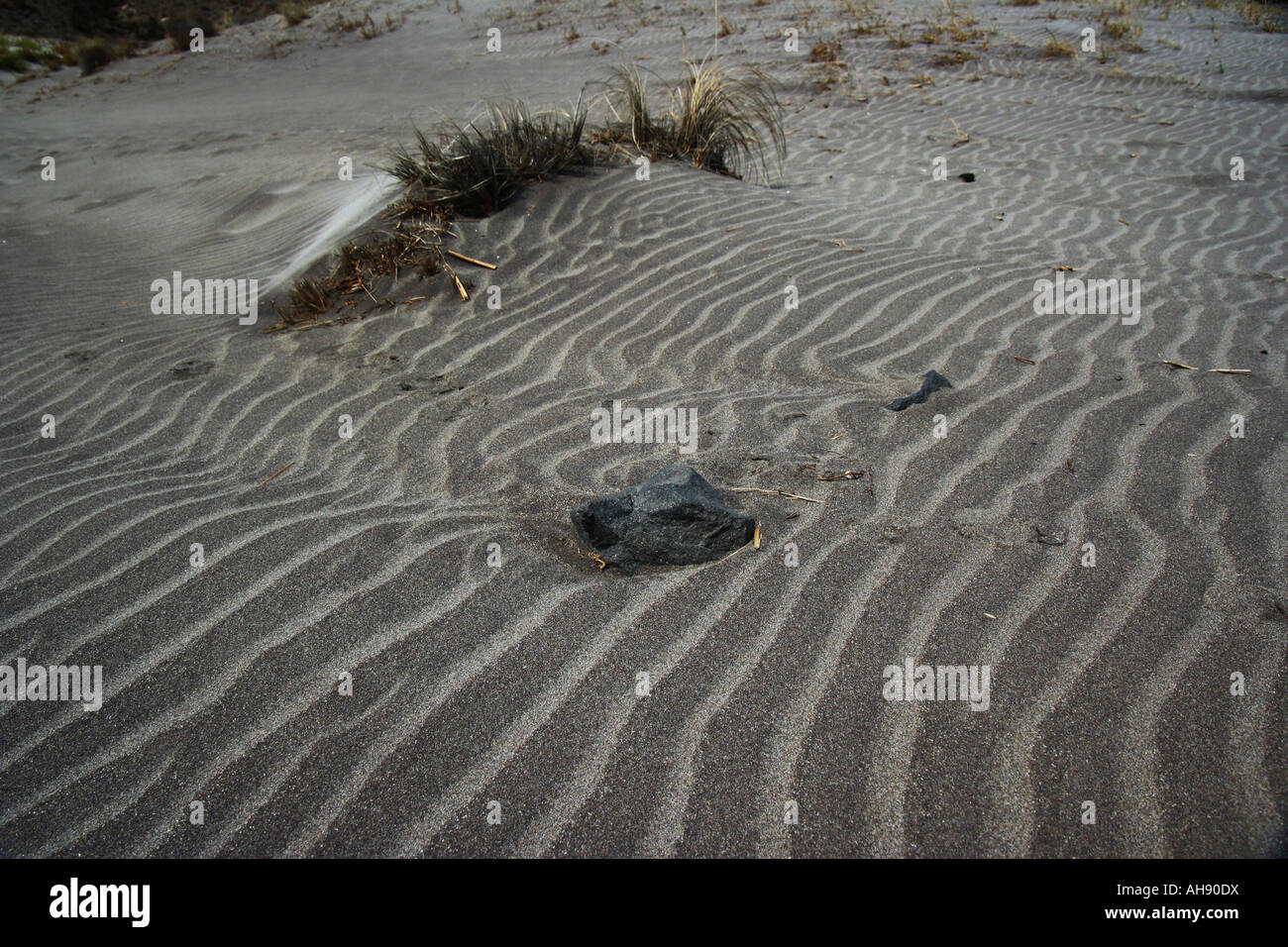 Rocks and sand dunes Stock Photo - Alamy