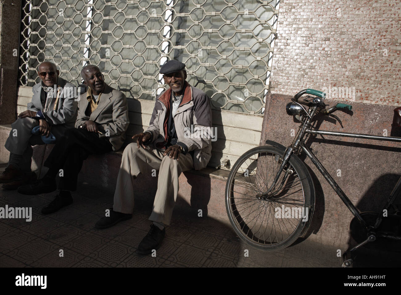 Local men relax on the streets of Asmara, Eritrea Stock Photo - Alamy