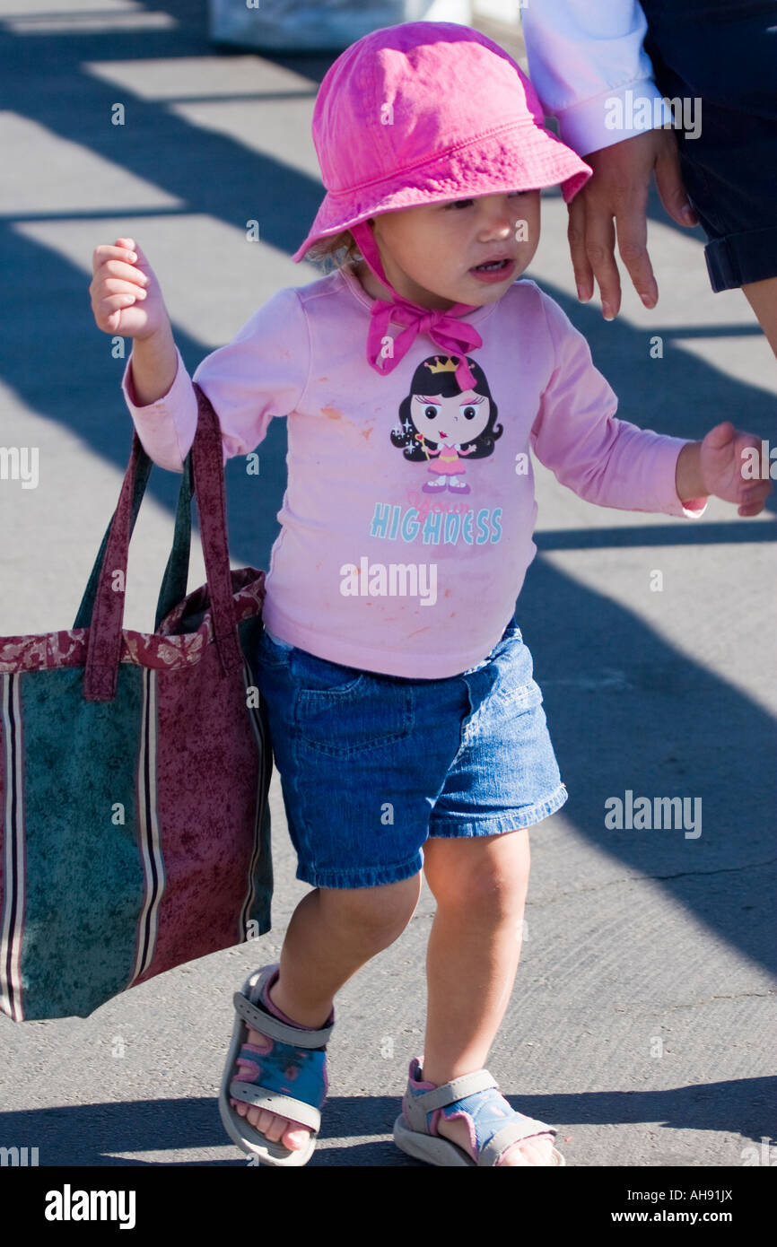 Child reaching bag hi-res stock photography and images - Alamy
