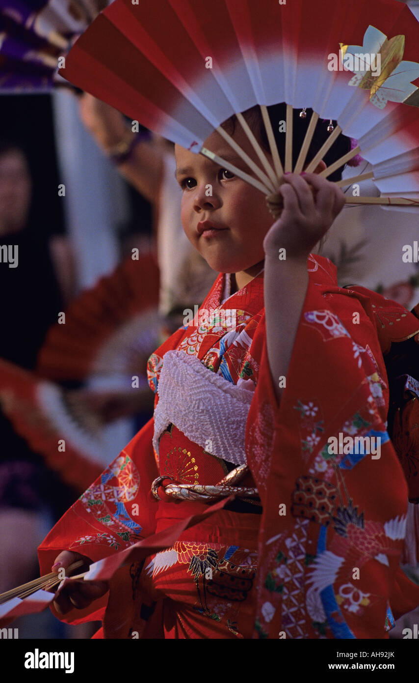 Young girl dancing with fan at the Bon Odori celebration Seattle ...
