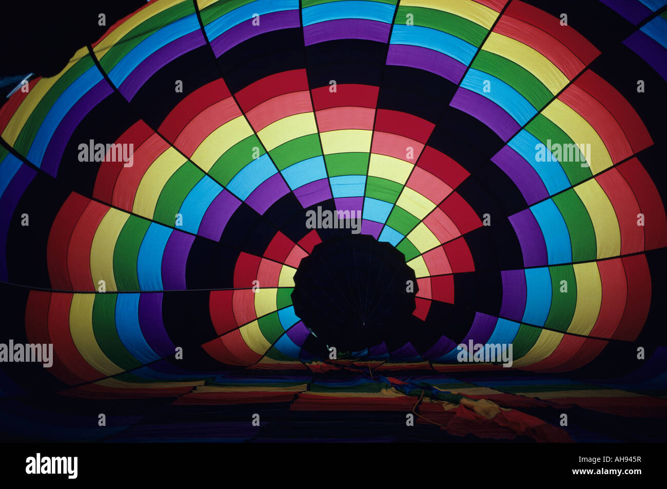 Looking inside a hot air balloon before lift off with multi colored ...