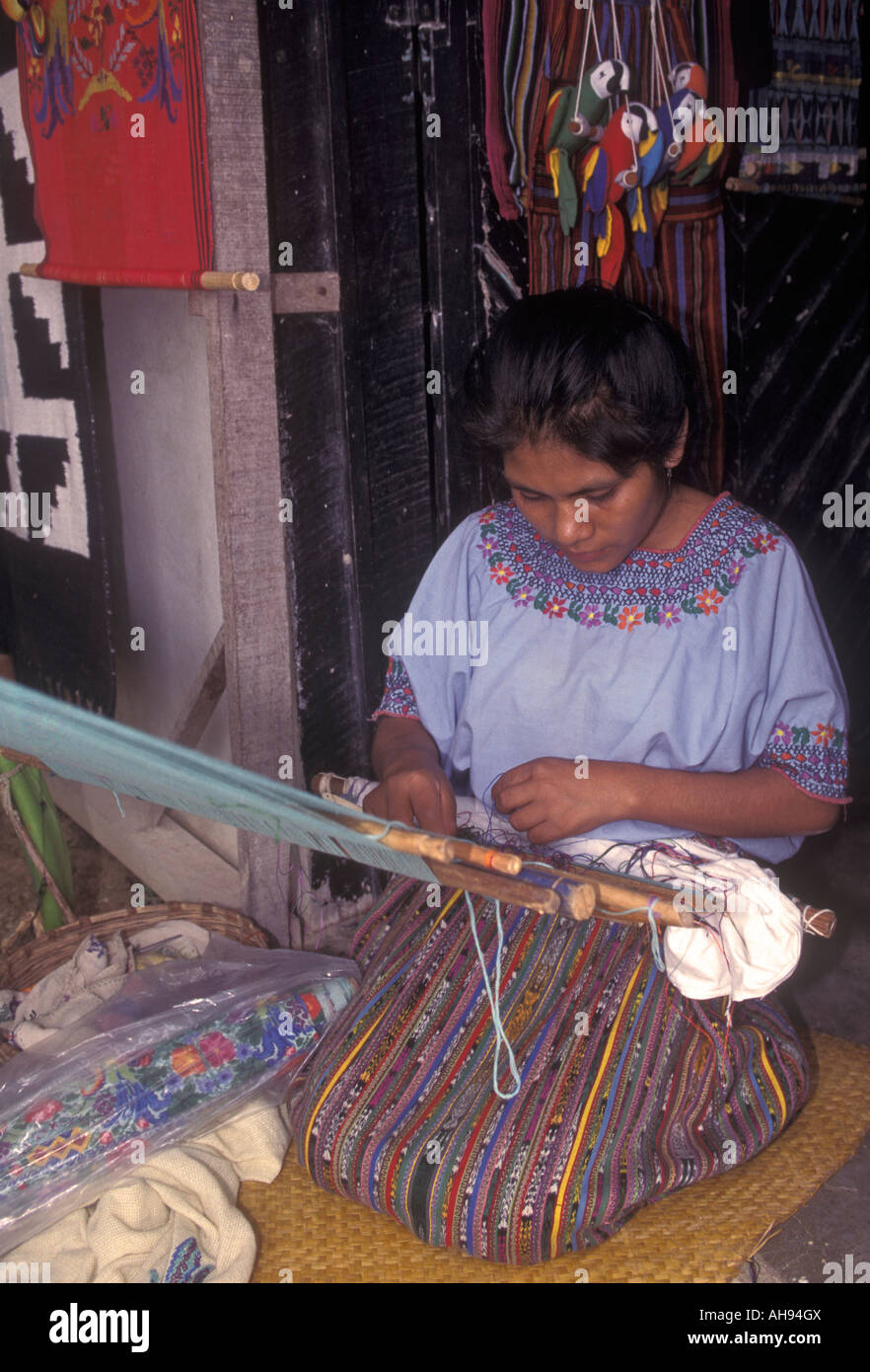 Maya girl weaving in Guatemala Stock Photo - Alamy