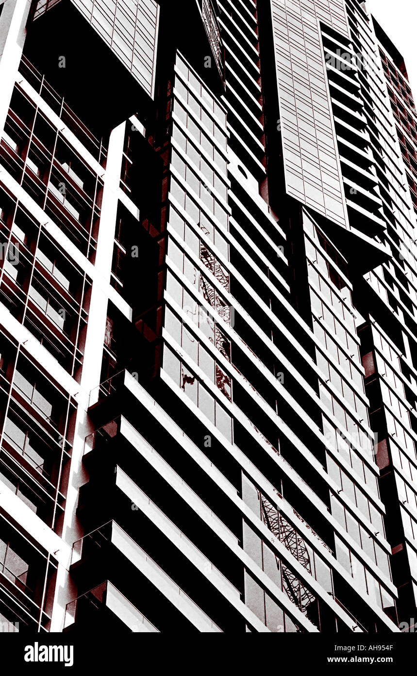 Hard edgy facade futuristic looking hi rise building monochrome ...