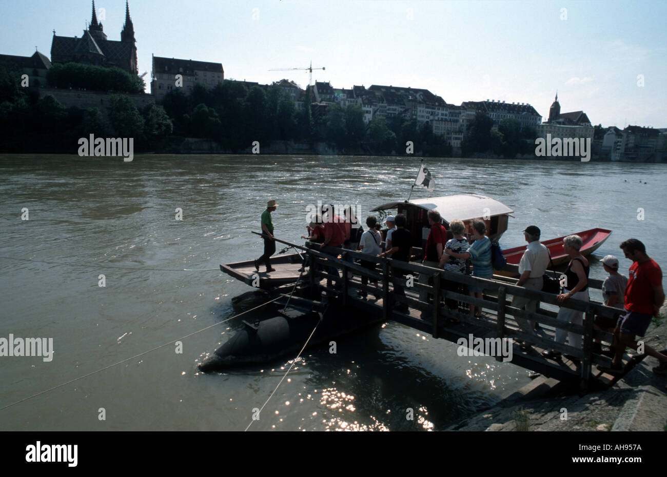Basel with River Rhine The Rhine ferry boat is propelled Stock Photo ...
