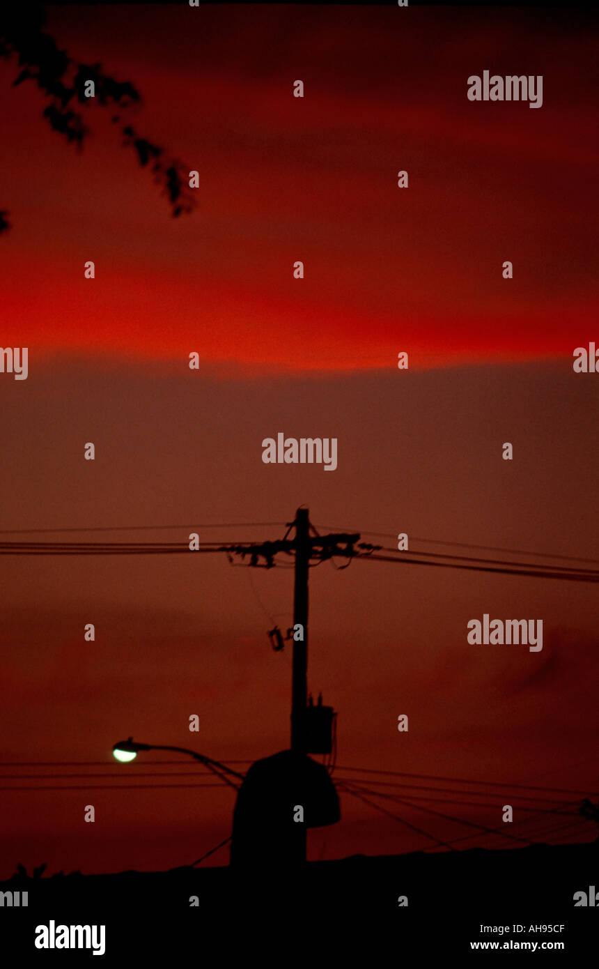 Industrial telephone pole communications sunset Stock Photo - Alamy